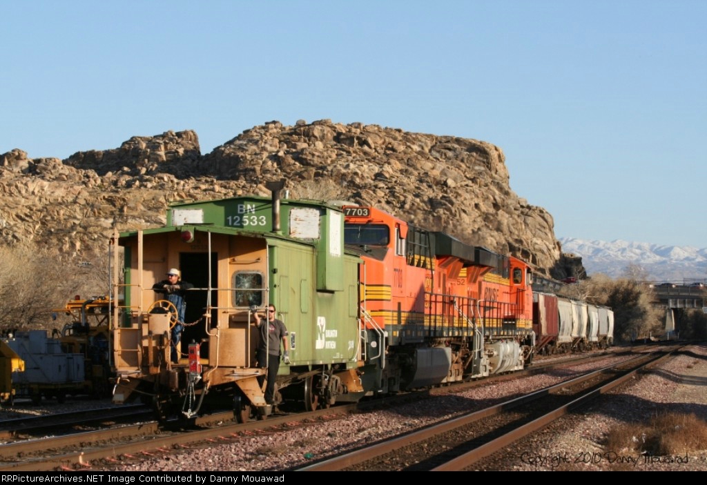 BNSFs Victorville Local Heads Back to the Yard with a BN Caboose.